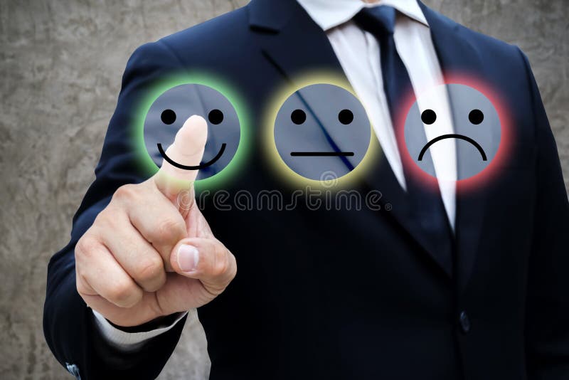 Businessman Hand Pointing the Smiley Face Icon from Screen As Positive ...