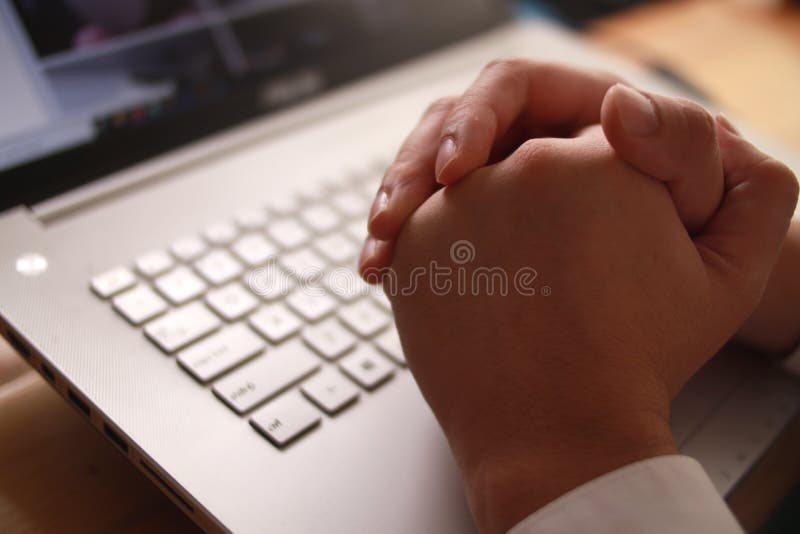 Businessman Hand in Pray Gesture in Front of Laptop Computer Stock ...