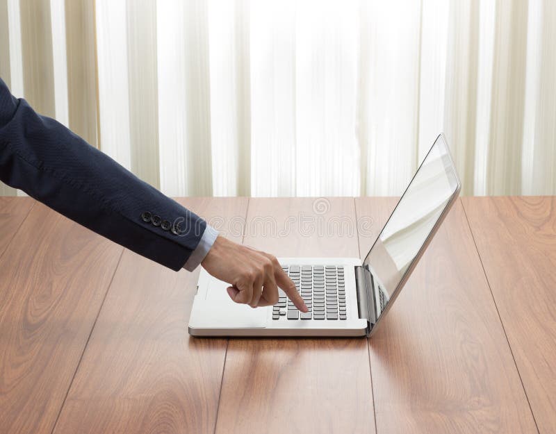 Businessman Hand Pressing Laptop Keyboard Stock Photo - Image of ...