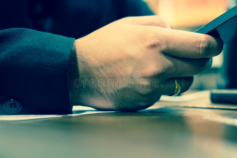 Businessman hand use phone stock photo. Image of hand - 67927900