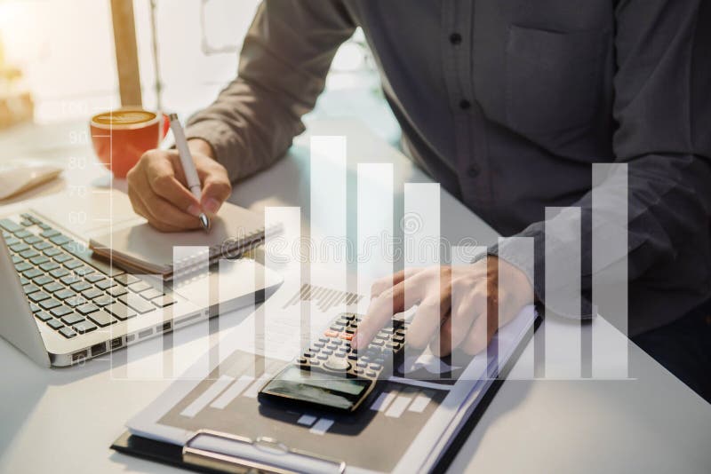 Businessman Hand Using Calculator and Writing Make Note with Calculate ...