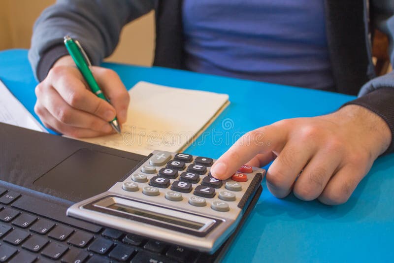 Businessman Hand Using Pen for Writing Data Information. a Businessman ...