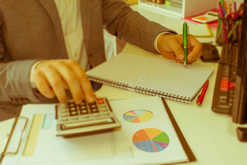 Businessman Hand Using Pen for Writing Data Information on Paperwork ...