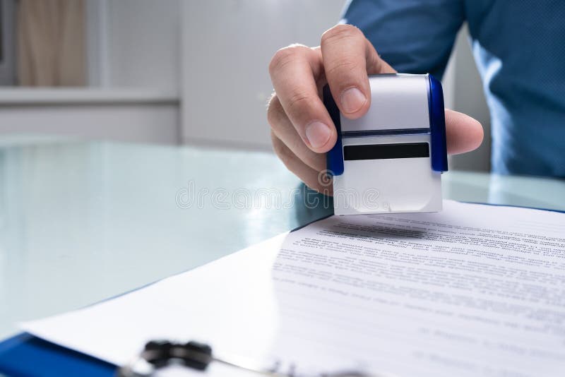 Businessman Hand Using Stamper on Document Stock Image - Image of hand ...