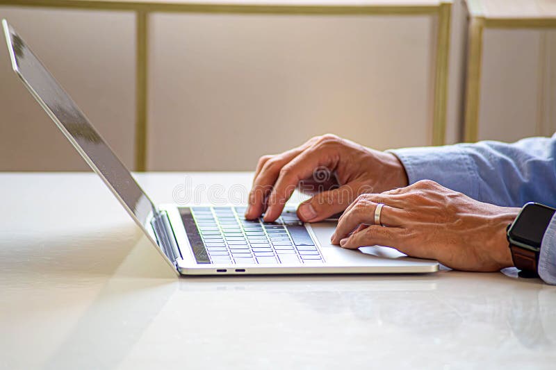 Businessman Hand Work on Capable Laptop Computer at Office Table Close ...