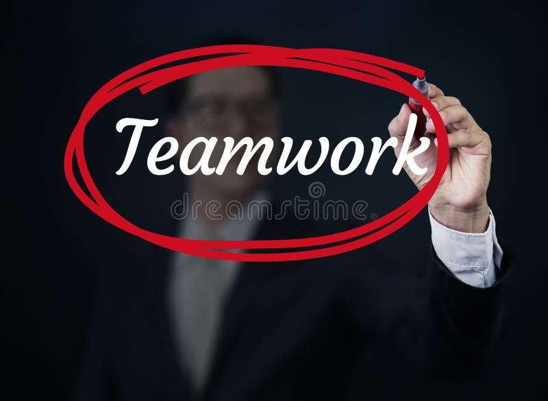 Businessman Hand Writing `Teamwork` with Red Marker on Transparent ... Businessman Hand Writing `Teamwork` with Red Marker on Transparent ...