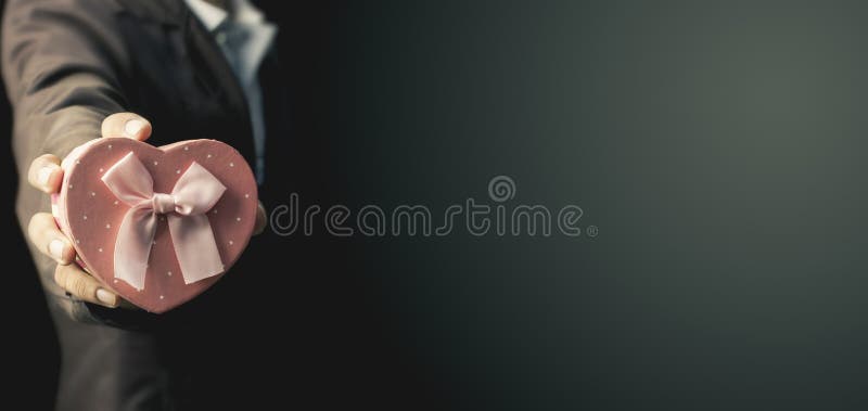 Businessman Handing a Heart Shaped Gift Box Stock Photo - Image of hand ...