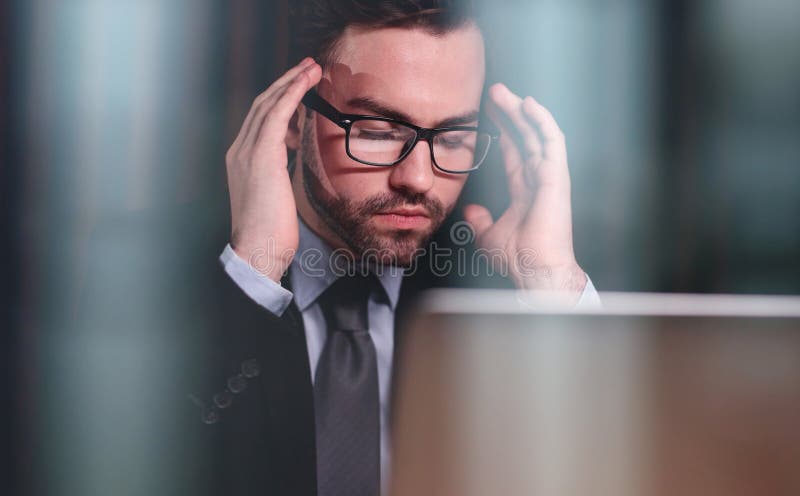 Tired Man Behind a Computer Screen from Boring Routine Work in the ...