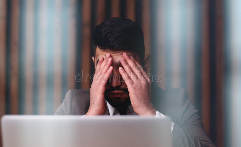 Businessman with Hands Behind Head Resting in Comfortable Office. Stock ...
