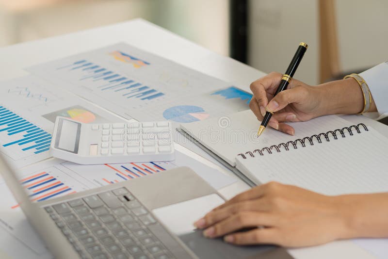 Businessman Hands on Keyboard of Laptop Computer Showing Data Analysis ...