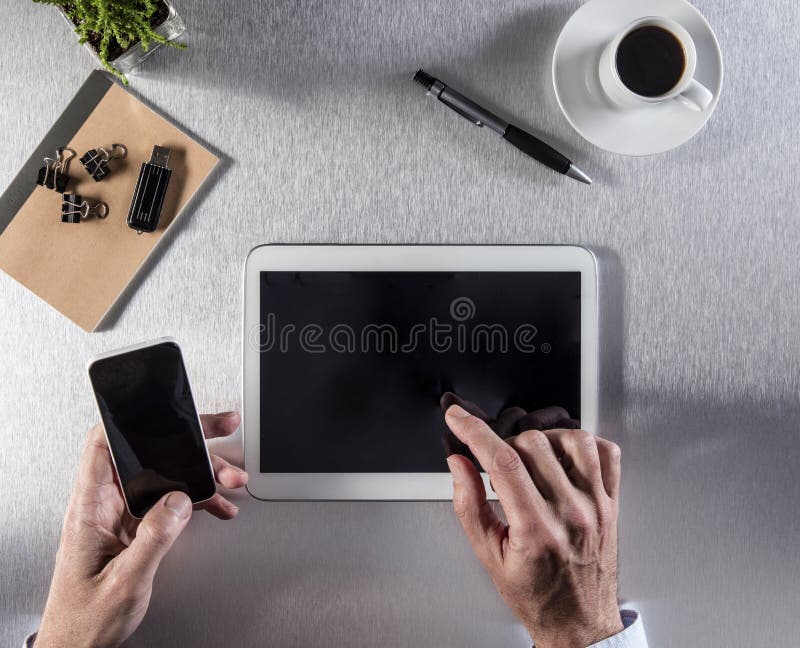 Businessman Hands Multitasking with Technology and Coffee at His Stock ...