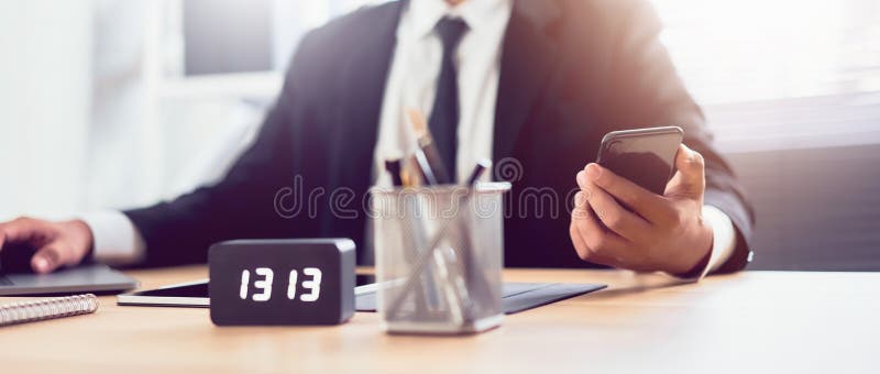Businessman Hands Using Smartphone with Digital Tablet on the Table and ...