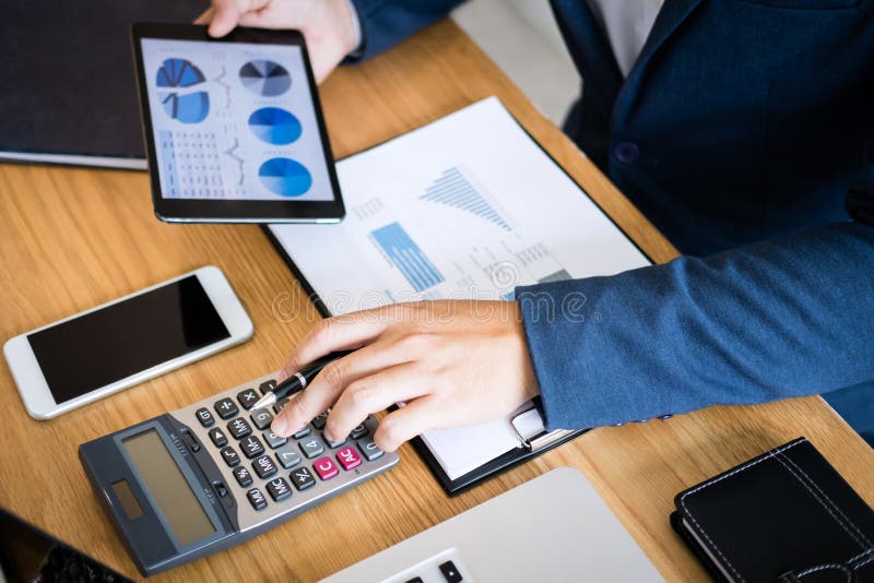 Businessman Hands Using Text Information on Digital Tablet To an Stock ...