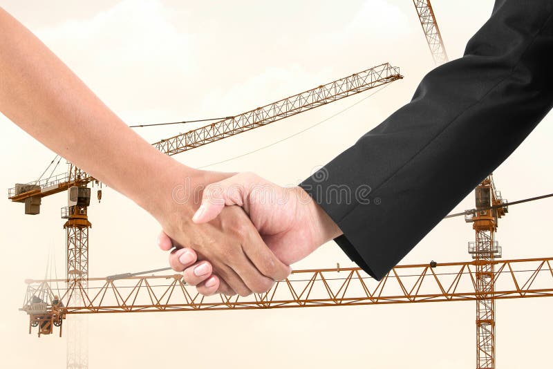 Businessman Handshake in Construction Crane. Stock Photo - Image of ...