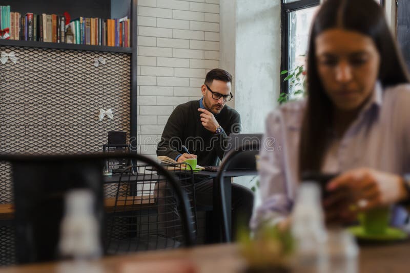 Businessman Having Coffee and Doing His Work in Cafe Stock Photo ...