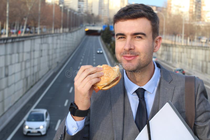 Businessman Having Fast Food in the City Stock Photo - Image of ...