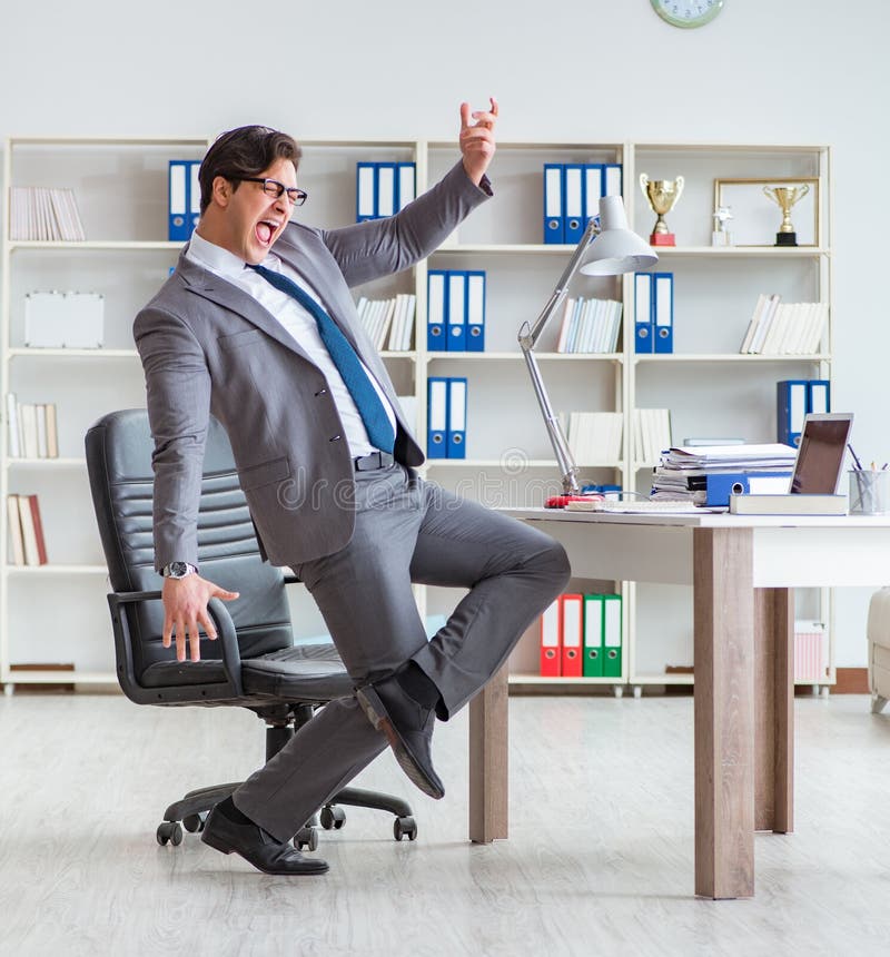 Businessman Having Fun Taking a Break in the Office at Work Stock Photo ...