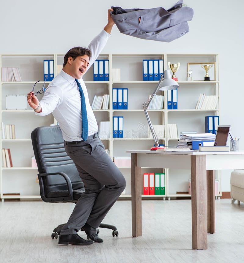 The Businessman Having Fun Taking a Break in the Office at Work Stock ... The Businessman Having Fun Taking a Break in the Office at Work Stock ...