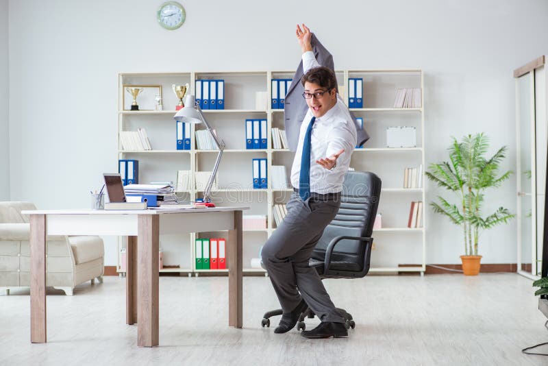 The Businessman Having Fun Taking a Break in the Office at Work Stock ... The Businessman Having Fun Taking a Break in the Office at Work Stock ...