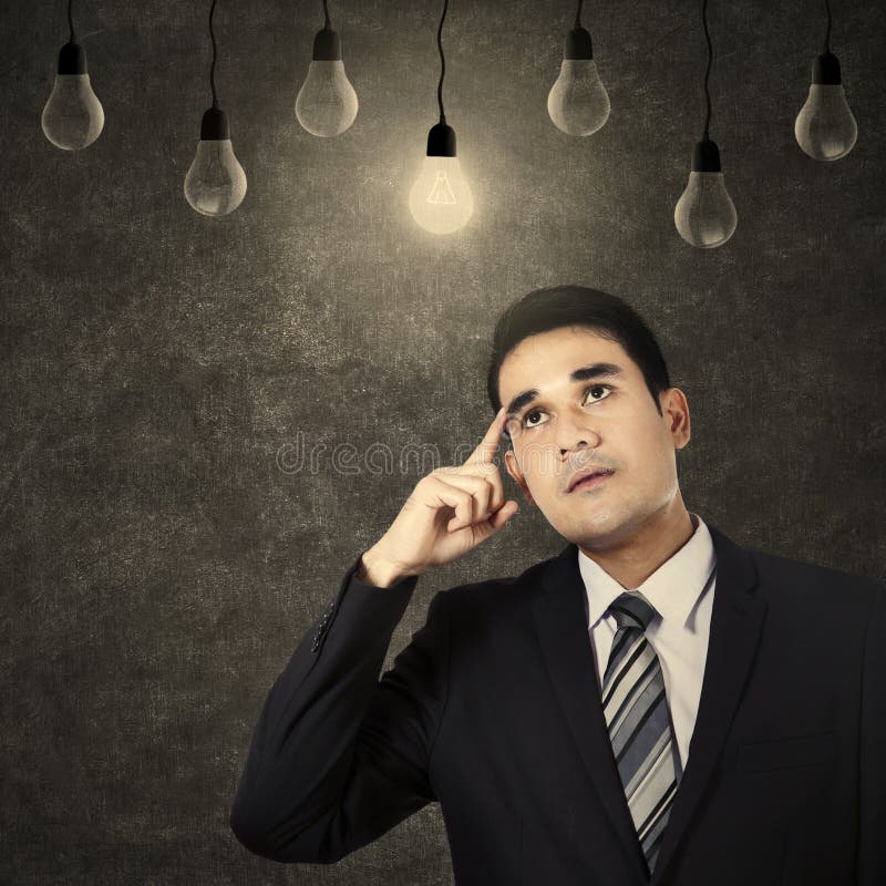 Businessman having an idea stock image. Image of look - 34730547