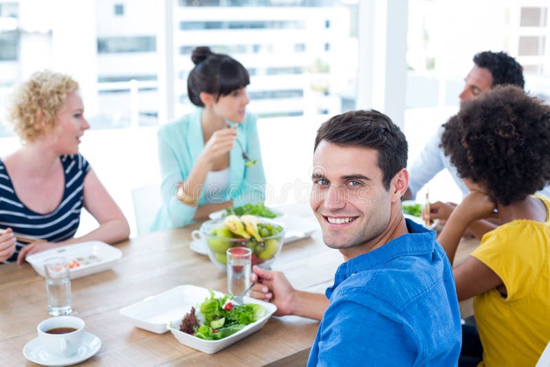 Businessman having lunch stock photo. Image of banana - 54775646