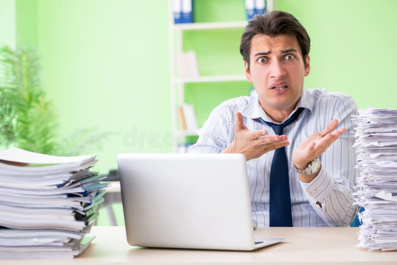 The Businessman Having Problems with Paperwork and Workload Stock Photo ...
