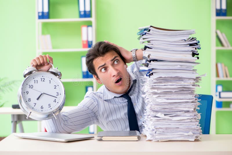 The Businessman Having Problems with Paperwork and Workload Stock Photo ...