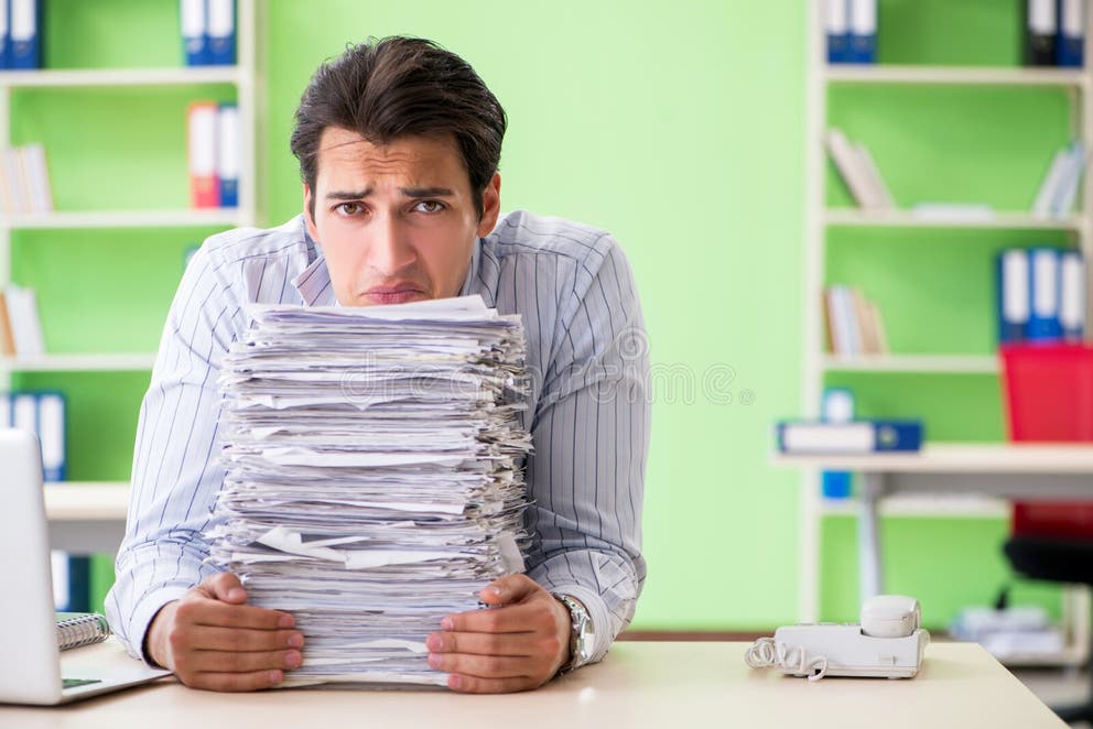 The Businessman Having Problems with Paperwork and Workload Stock Photo ...