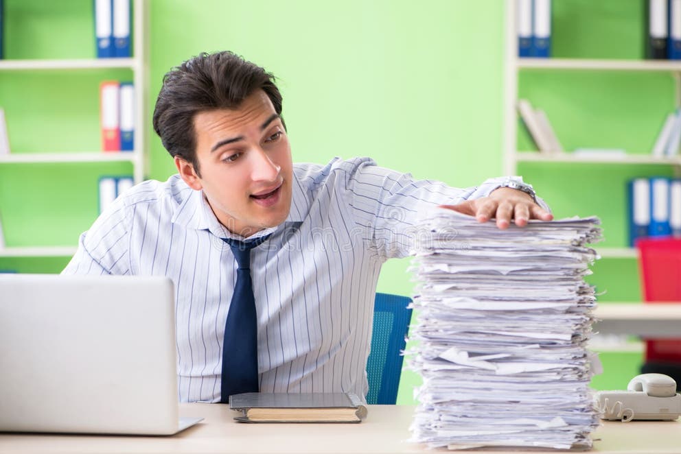 The Businessman Having Problems with Paperwork and Workload Stock Image ...