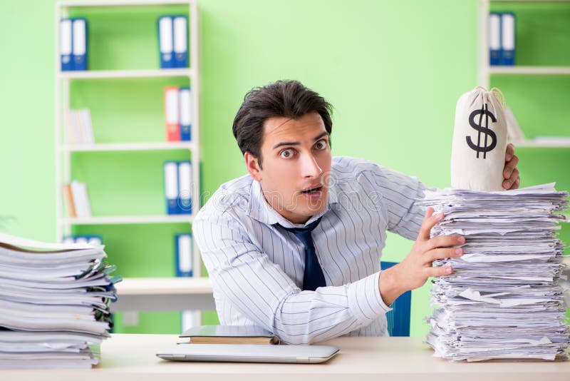 The Businessman Having Problems with Paperwork and Workload Stock Photo ...