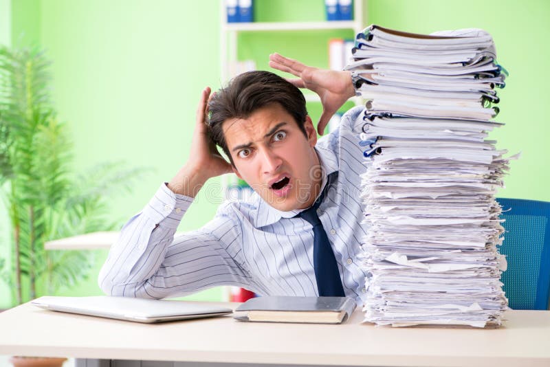 The Businessman Having Problems with Paperwork and Workload Stock Image ...