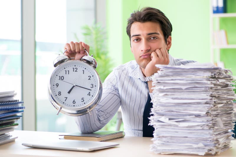 The Businessman Having Problems with Paperwork and Workload Stock Photo ...