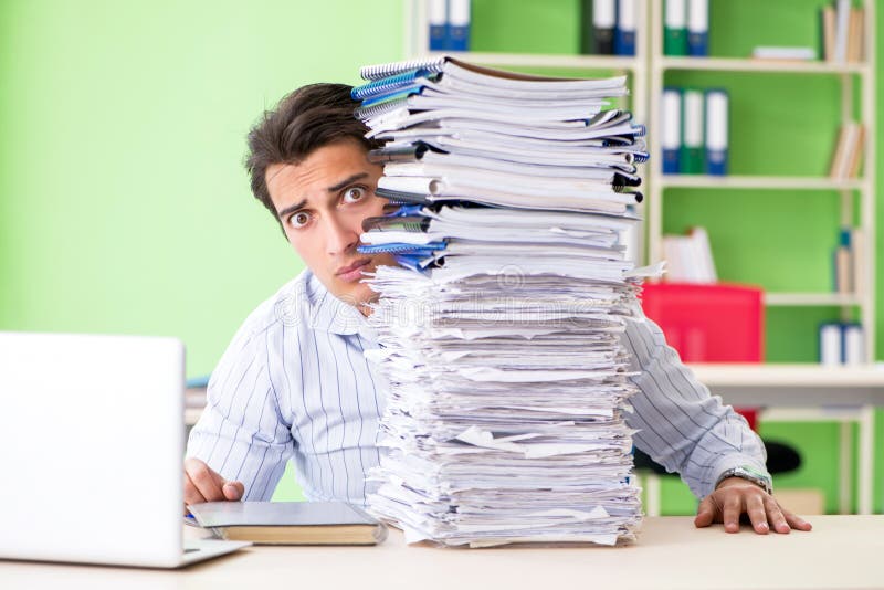 The Businessman Having Problems with Paperwork and Workload Stock Photo ...