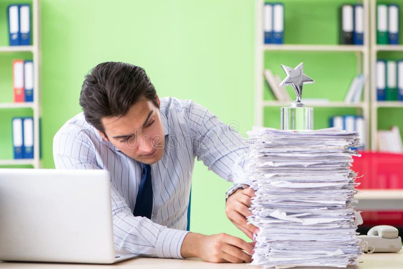 The Businessman Having Problems with Paperwork and Workload Stock Photo ...