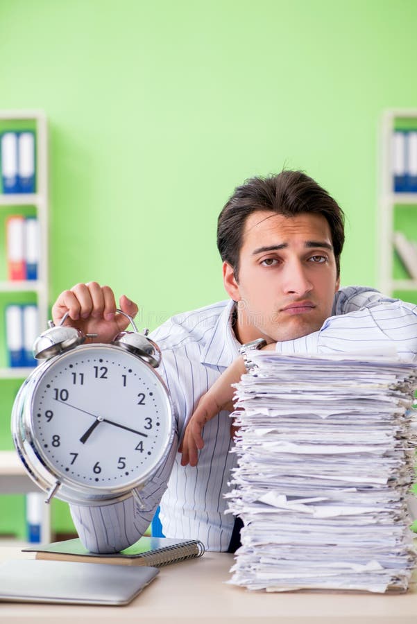 The Businessman Having Problems with Paperwork and Workload Stock Photo ...