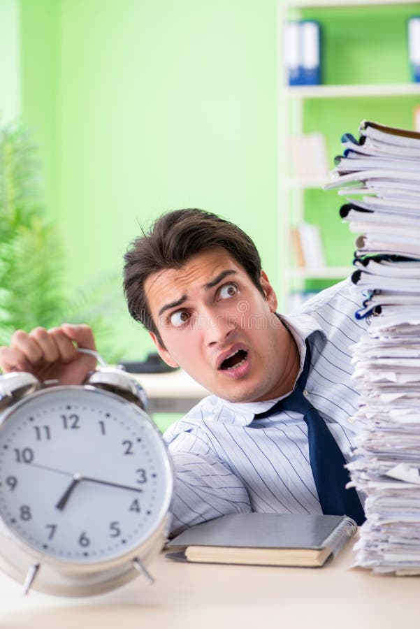 The Businessman Having Problems with Paperwork and Workload Stock Image ...