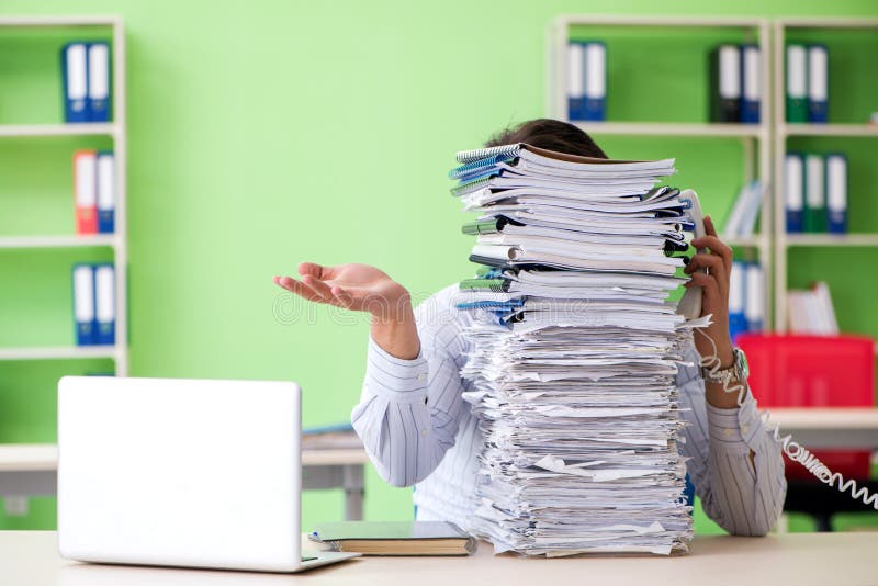 The Businessman Having Problems with Paperwork and Workload Stock Photo ...