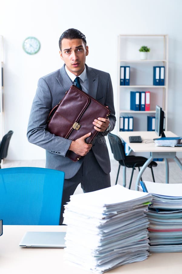 Businessman with Heavy Paperwork Workload Stock Image - Image of ...