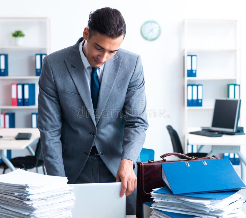 Businessman with Heavy Paperwork Workload Stock Photo - Image of ...
