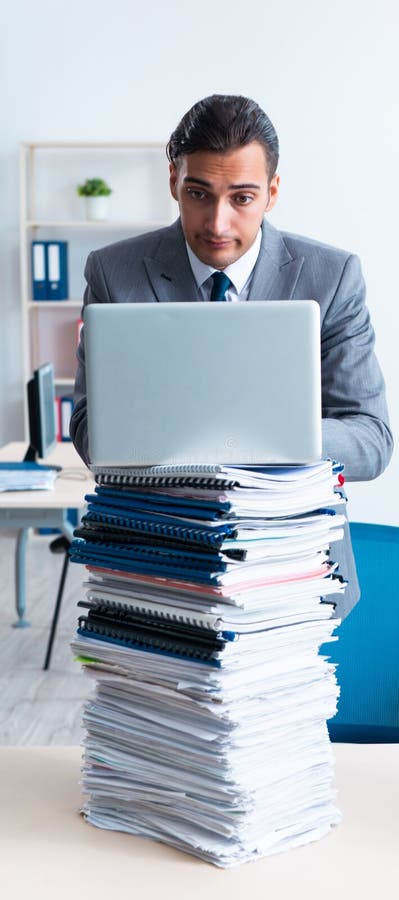 Businessman with Heavy Paperwork Workload Stock Photo - Image of ...