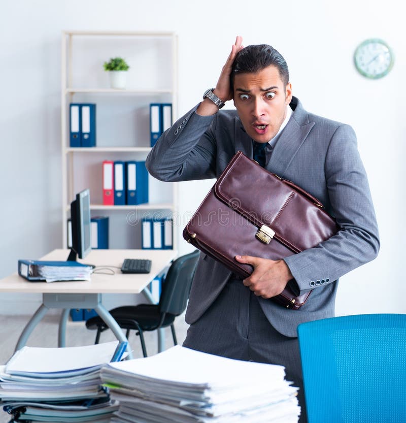 Businessman with Heavy Paperwork Workload Stock Image - Image of pile ...