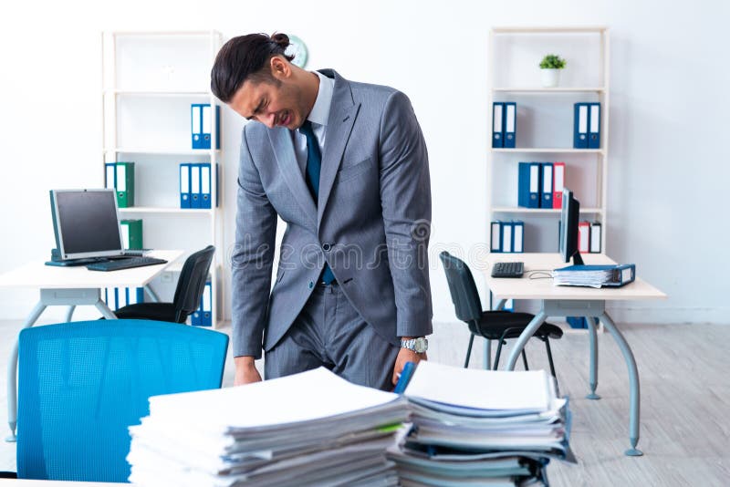 Businessman with Heavy Paperwork Workload Stock Image - Image of intern ...
