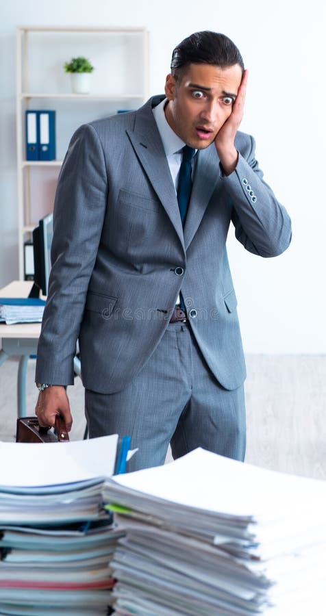 Businessman with Heavy Paperwork Workload Stock Photo - Image of ...