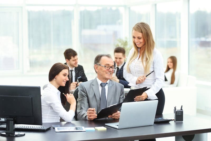 Businessman and His Assistants Secretaries in His Office. Stock Image ...