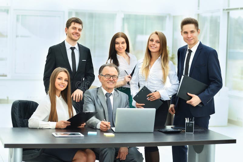 Team) at modern office stock photo. Image of businesspeople - 19102386