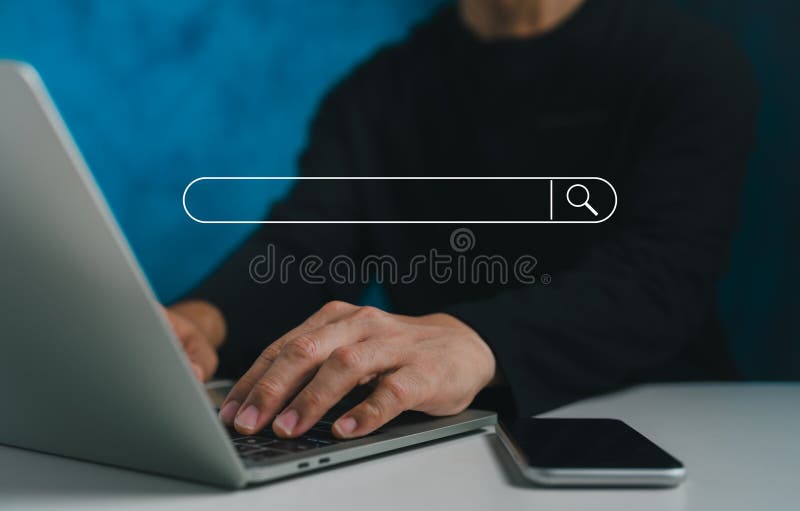 The Businessman at His Office Desk, Using a Laptop Computer. the Idea ...