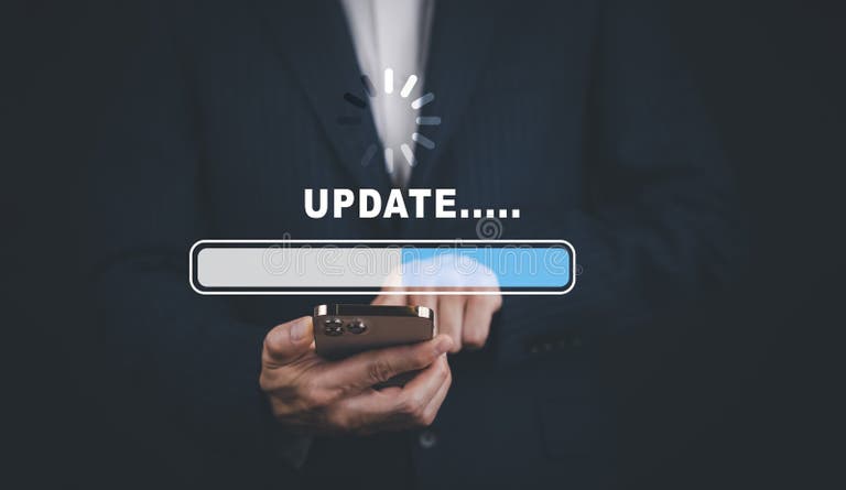 Businessman Hold Smart Phone with Update Software Computer Program ...