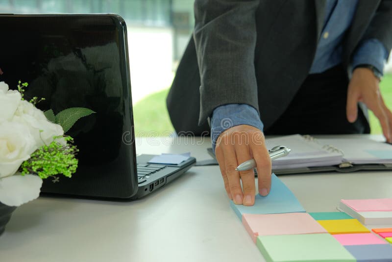 Businessman Hold Sticky Note Reminder Schedule for Organizing Pl Stock ...