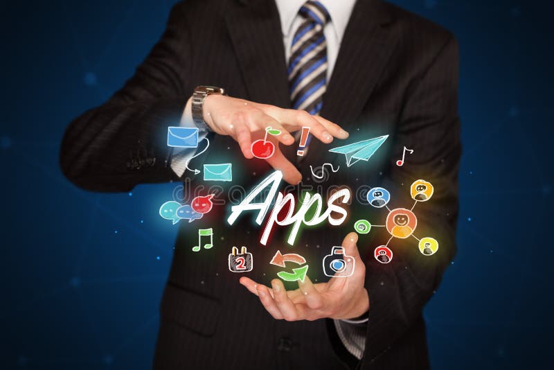Businessman holding apps stock photo. Image of icons - 90896006