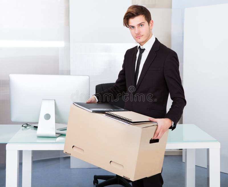 Businessman holding box stock photo. Image of model, adult - 52429206